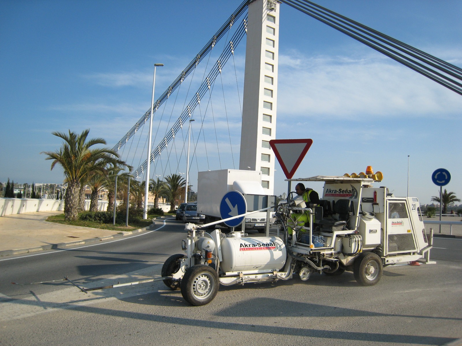 Reflective road markings with conventional materials